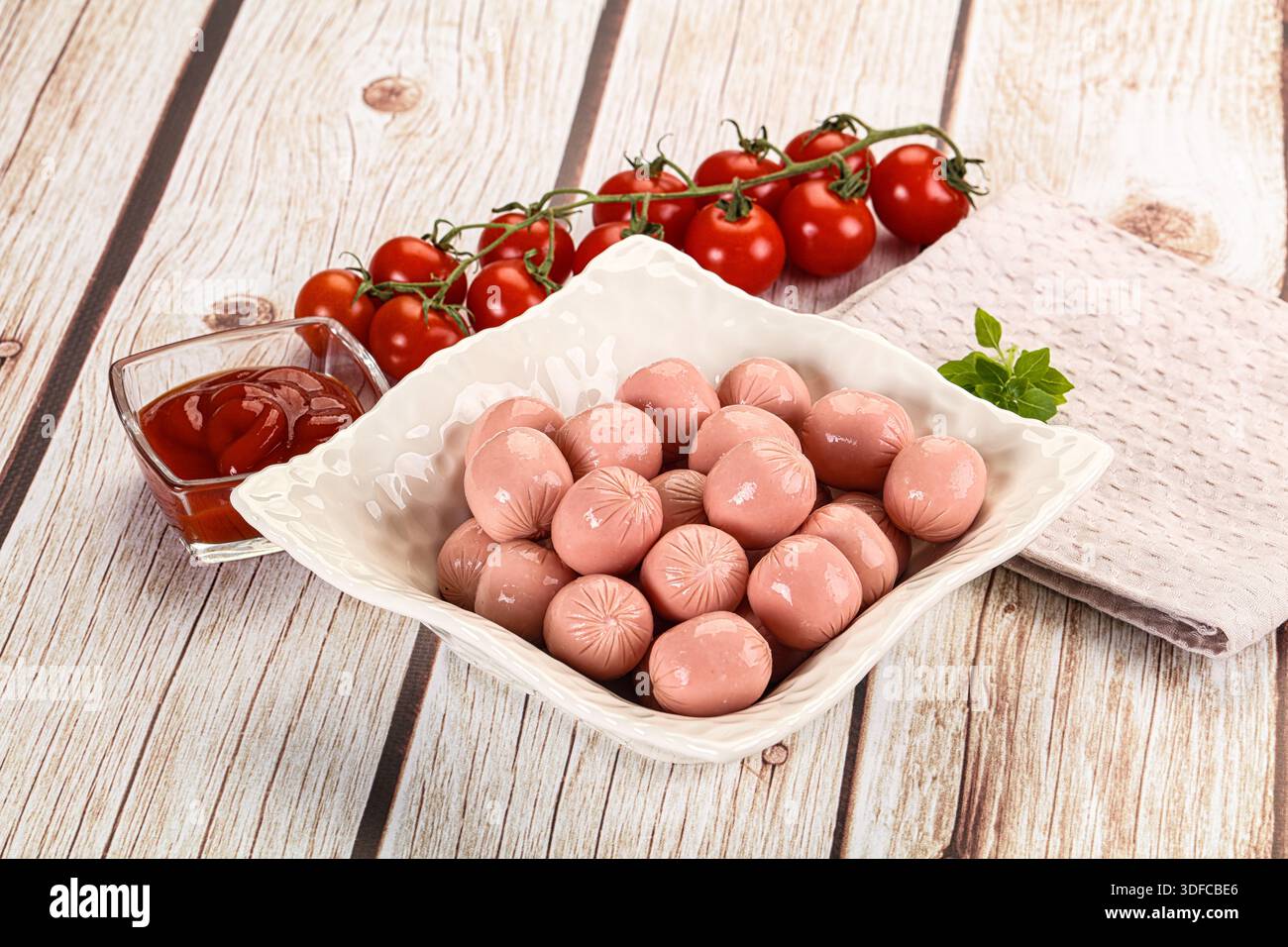 Dietary baby mini sausages for kids snack Stock Photo - Alamy