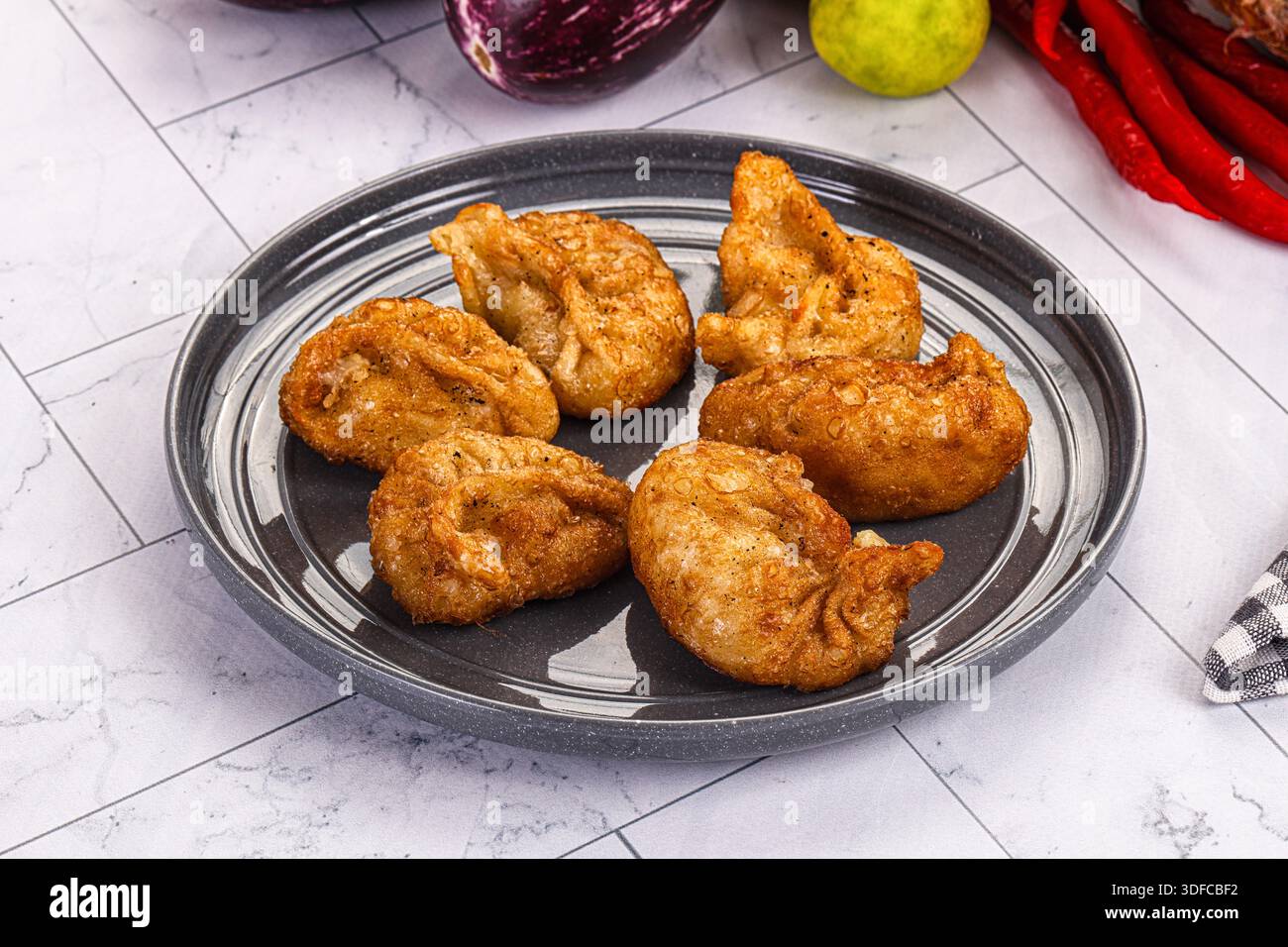 Tibetian traditional fried momo stuffed dumplings Stock Photo - Alamy