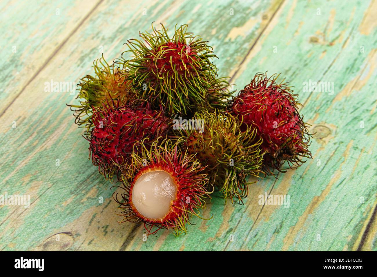 Organic tropical ripe sweet Rambutan fruit Stock Photo - Alamy
