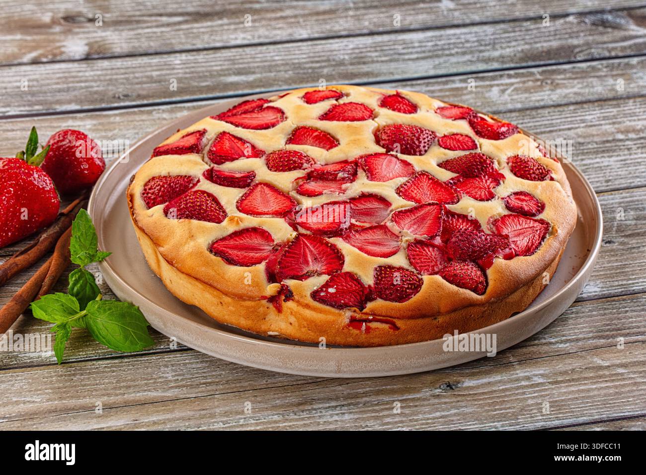 Strawberry pie tart served mint for breakfast Stock Photo - Alamy