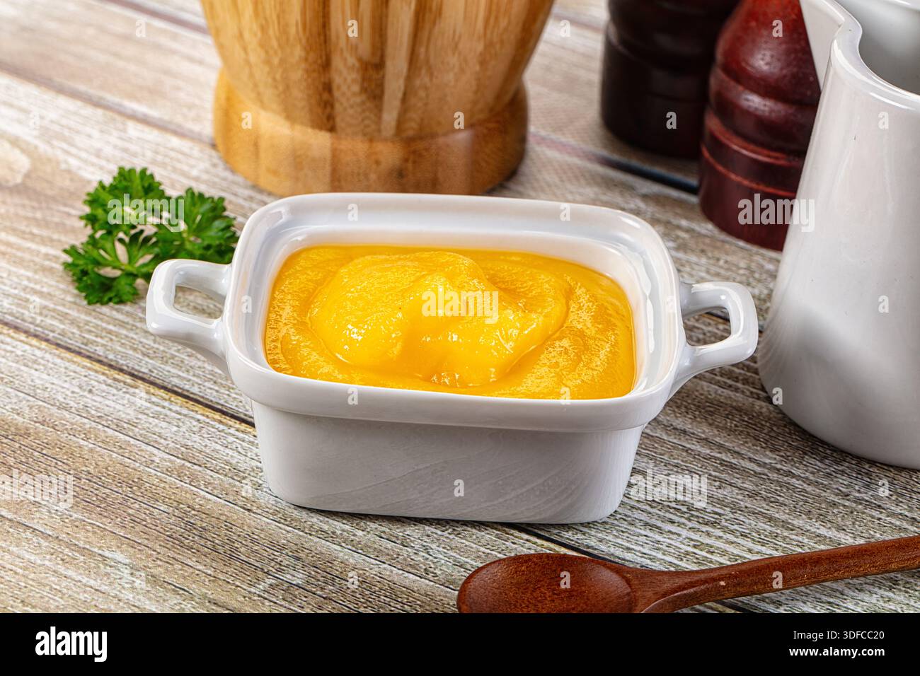 Golden Ghee melted homemade Indian butter Stock Photo - Alamy