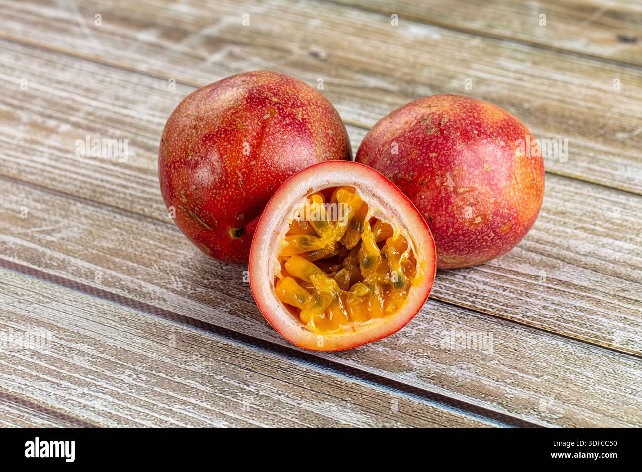 Ripe sweet juicy exotic maracuya passion fruit Stock Photo - Alamy