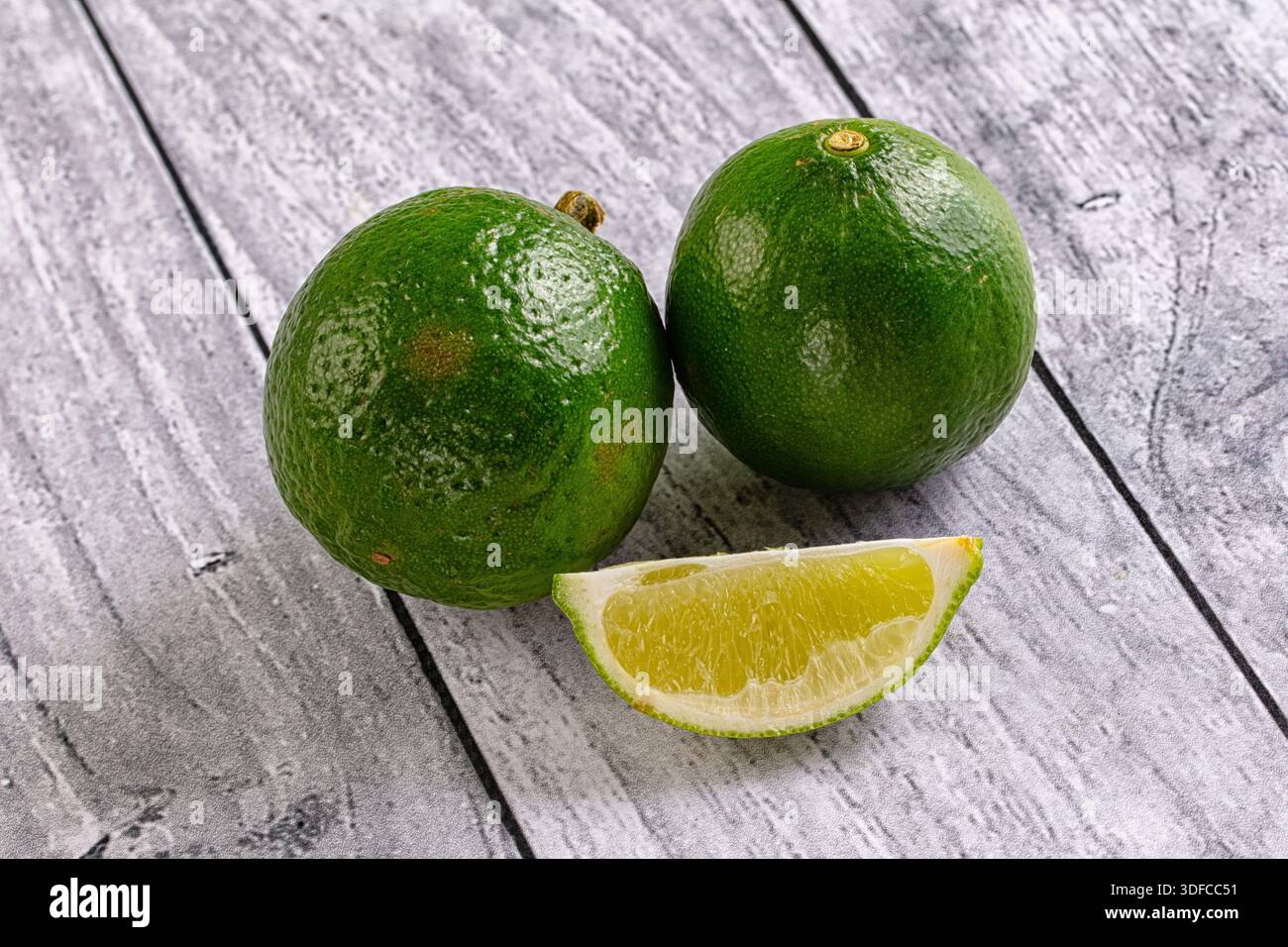 Fresh green sour lime citrus fruit Stock Photo - Alamy