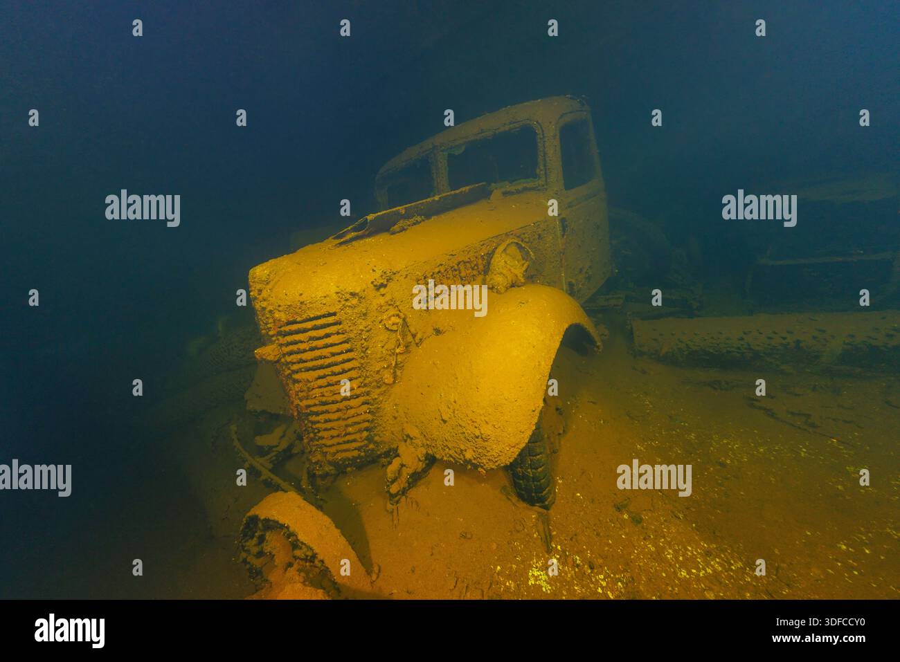 A military truck sits preserved inside the cargo hold of the Hoki Maru ...