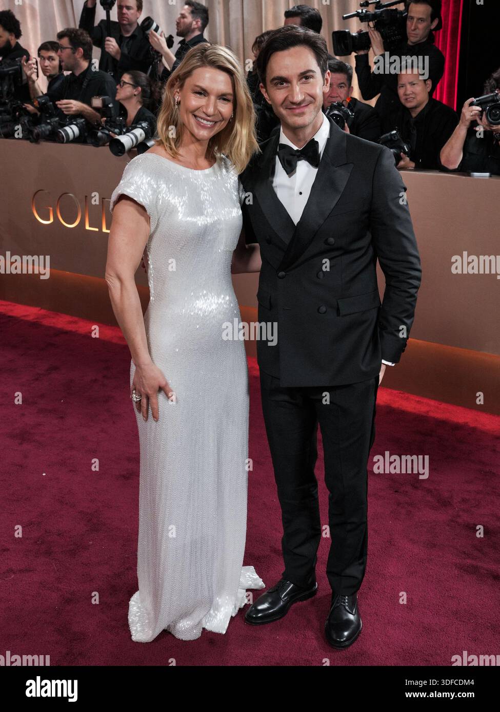 Claire Danes and Daniel Pearle walking on the red carpet at The 83rd ...
