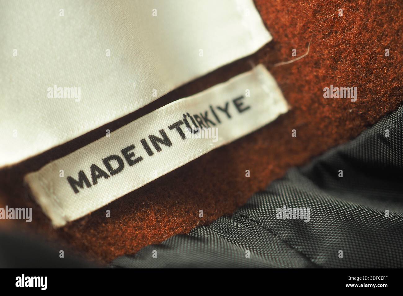 Clothing label showing origin from Turkey on fabric Stock Photo - Alamy