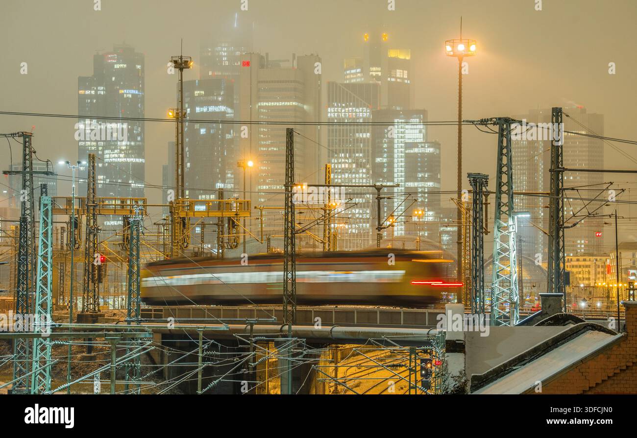 12 January 2026, Hesse, Frankfurt/Main: A regional train arrives at the ...