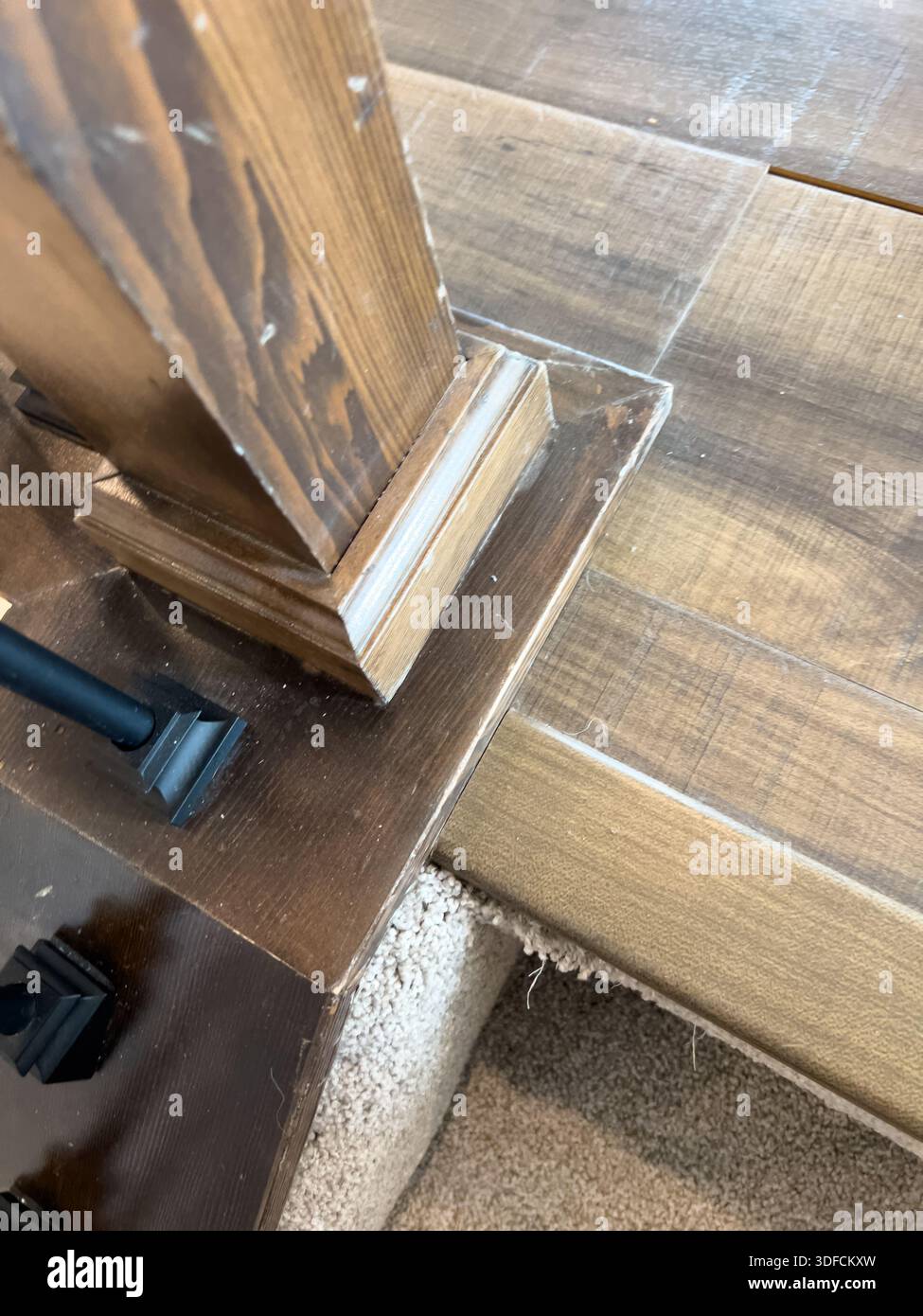 Wood Railing Post with Stair Trim and Floor Stock Photo - Alamy