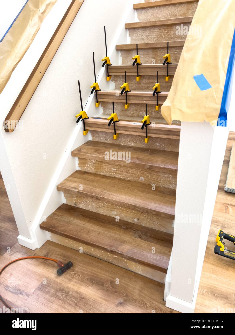 Stair installation with clamp support tools Stock Photo - Alamy