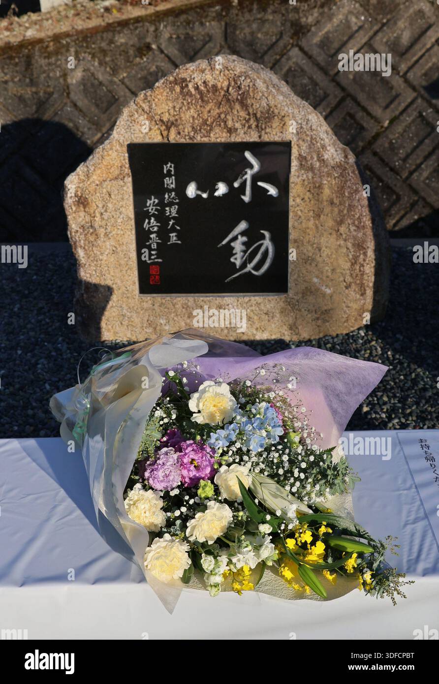 The memorial for former PM Shinzo Abe is offered a bunch of flowers by ...