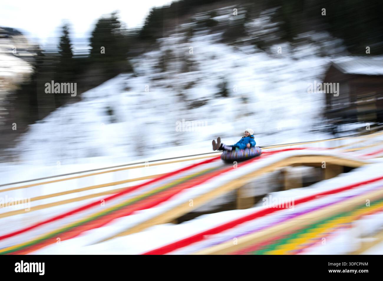 (260112) -- ALMATY, Jan. 12, 2026 (Xinhua) -- A child enjoys ice slide ...