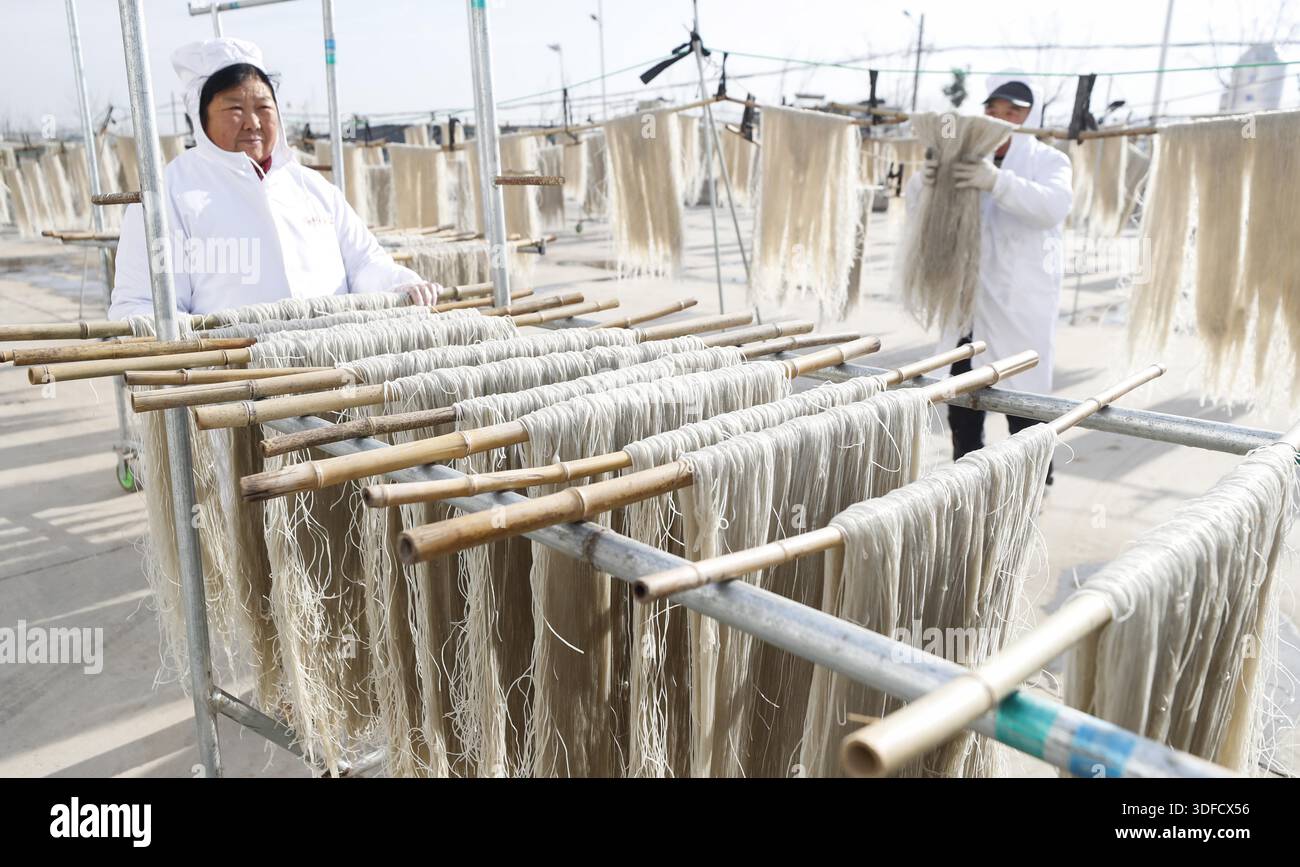 Villagers process sweet potato noodles in Meichang Village, Nanchenji ...