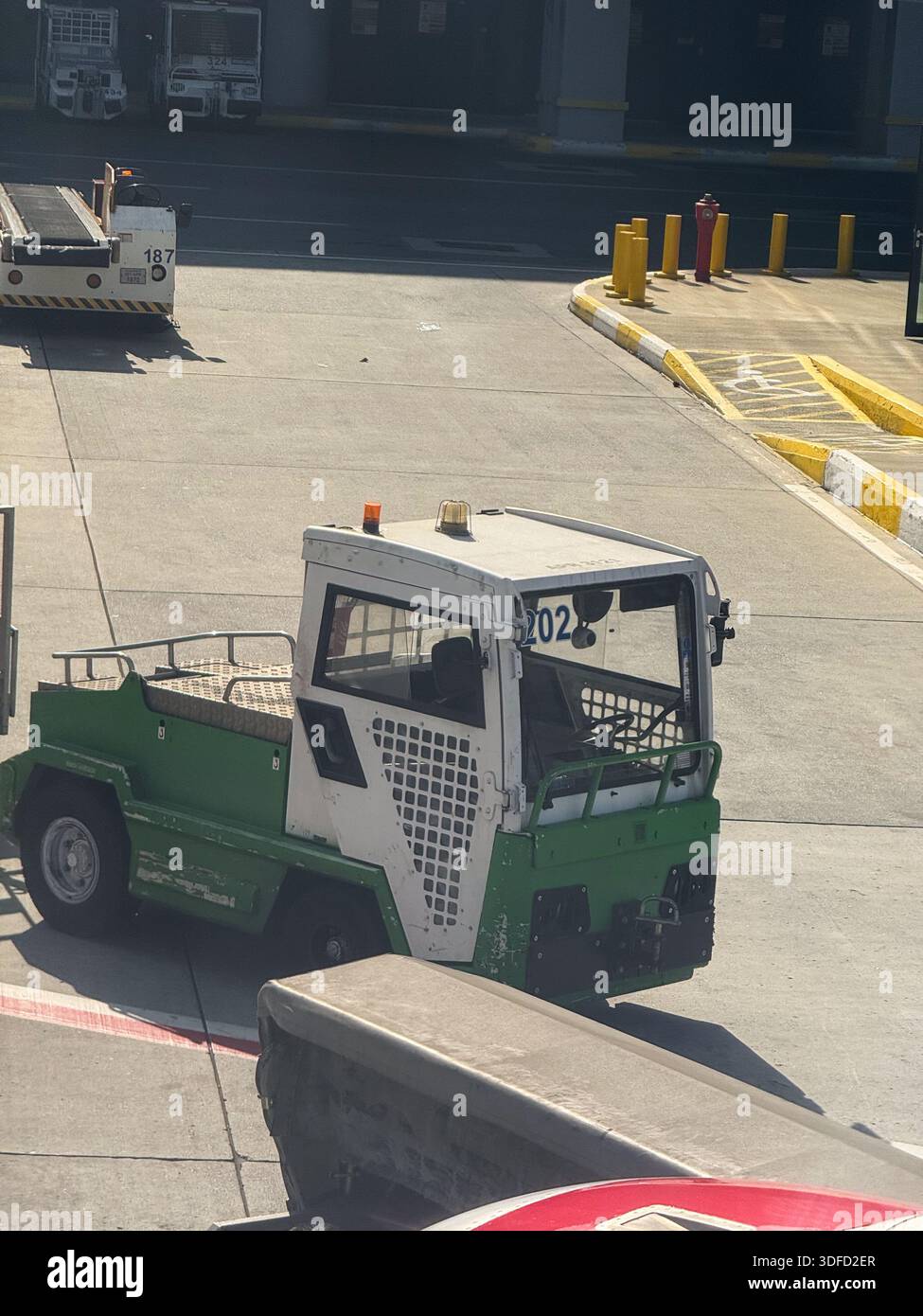 Airport ground service vehicle near terminal building. Aviation ...