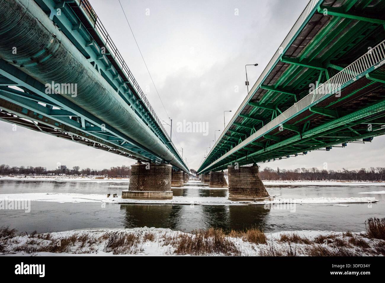 The Gdanski rail (left) and road (right) bridges are seen from ...
