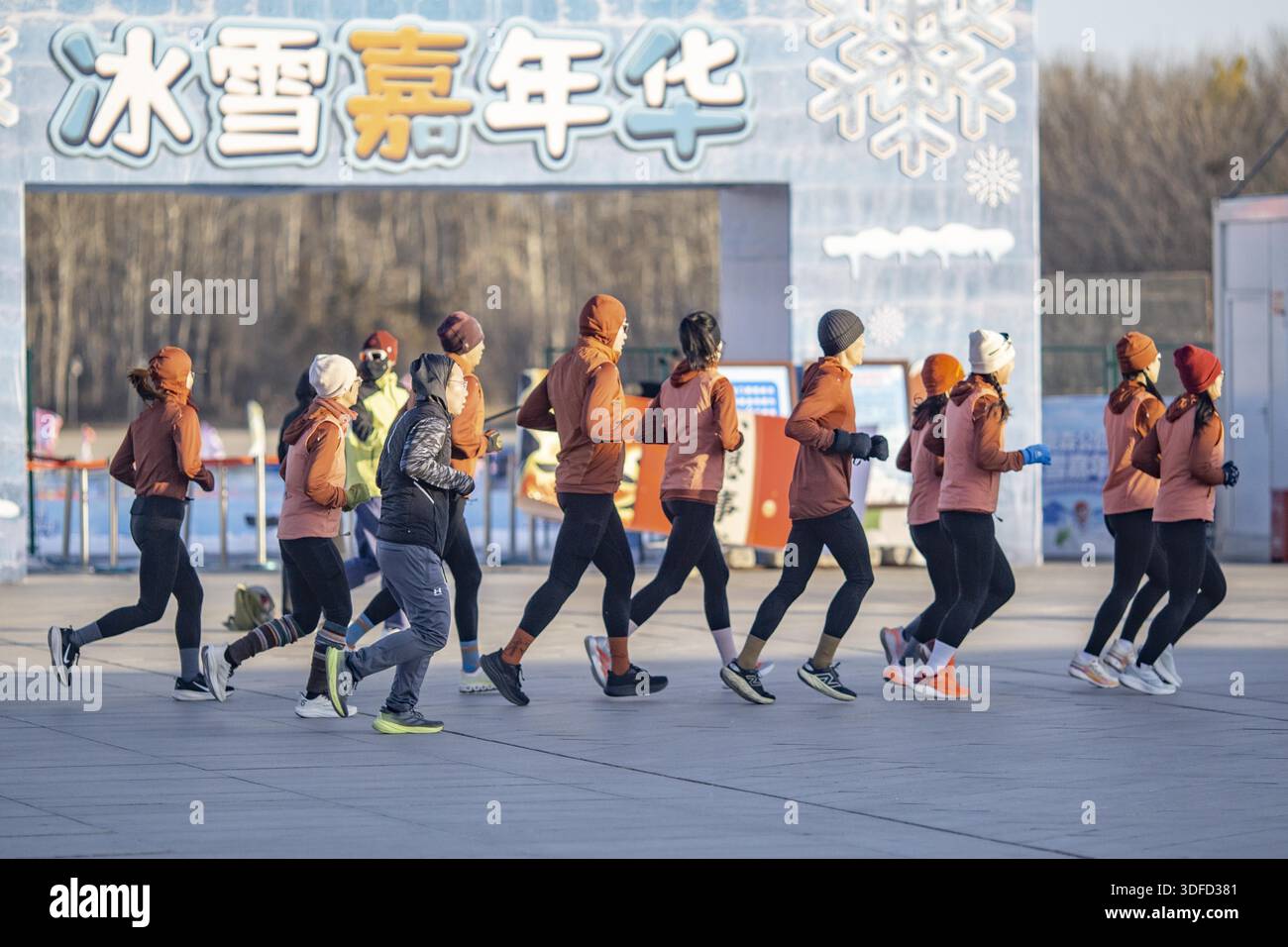 People jog in Olympic Forest Park in Beijing, China, 10 January, 2026 ...