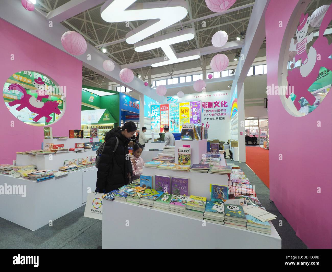 Visitors browse books at the Beijing Book Fair 2026 in Beijing, China ...