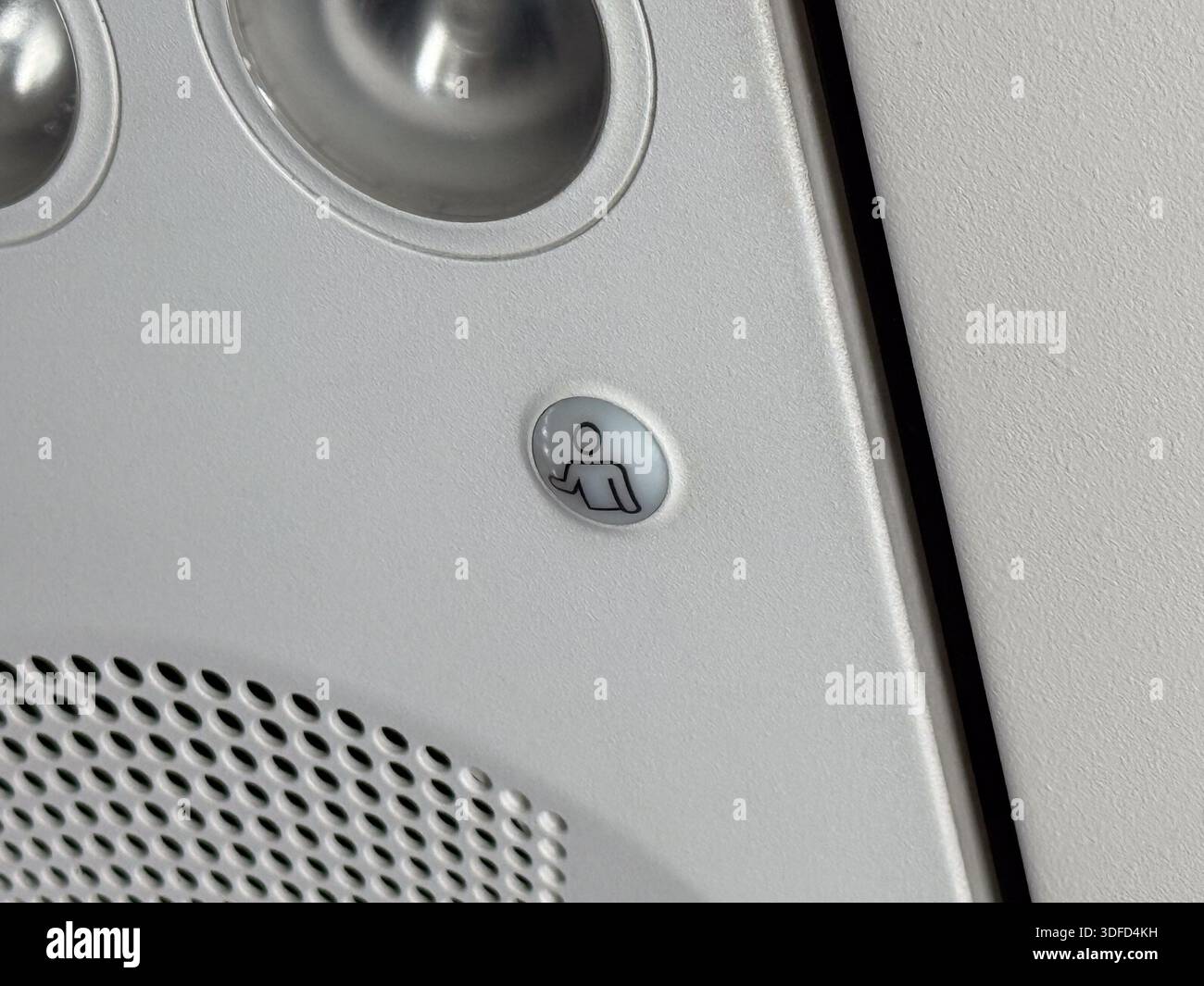 Passenger call button on aircraft ceiling panel. Inflight service ...