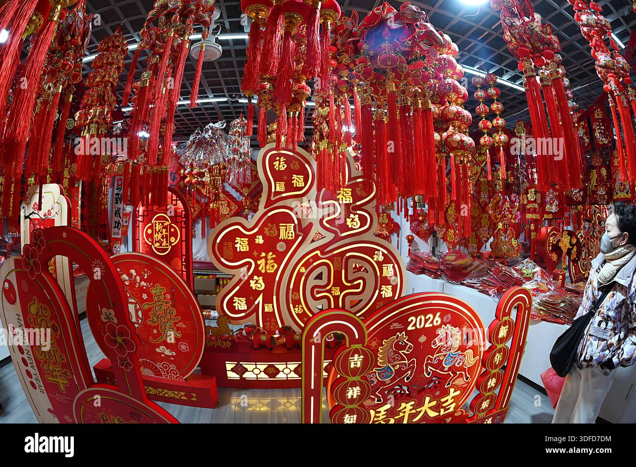 People shop Lunar New Year decorations at Chenghuang Temple market in ...
