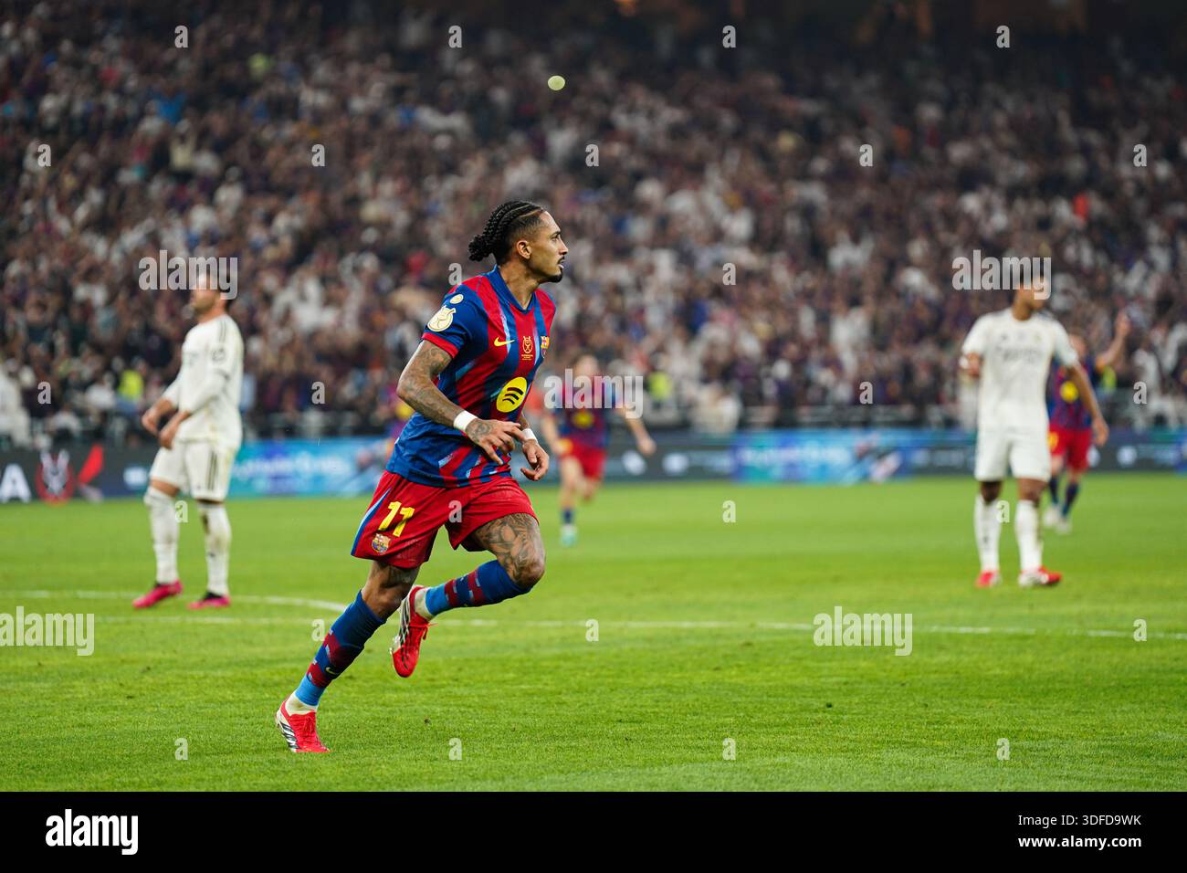 Barcelona's Raphael Dias Belloli, known as Raphinha celebrates during ...