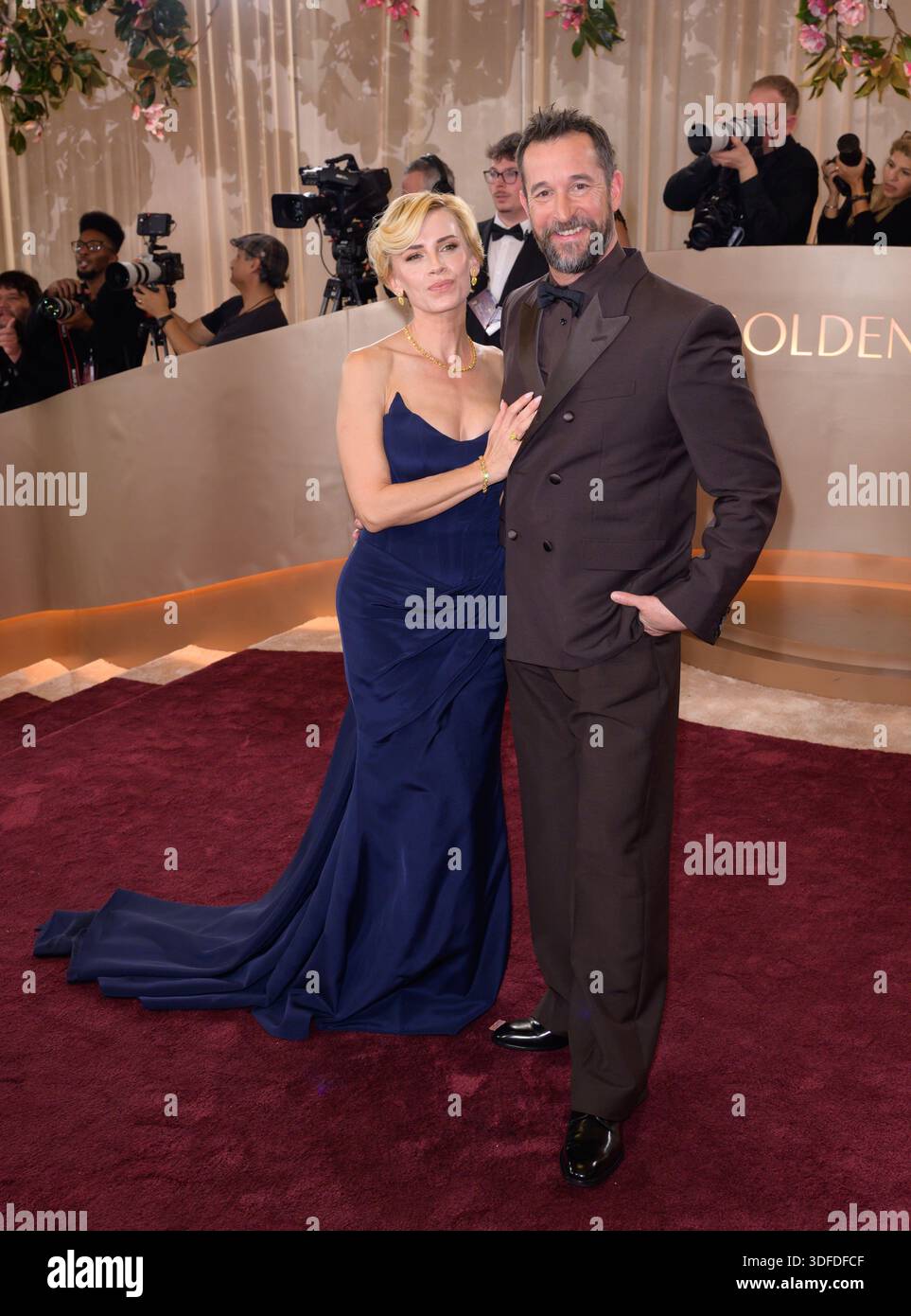 LOS ANGELES, USA. January 11, 2026: Noah Wyle & Sara Wells at the 83rd ...