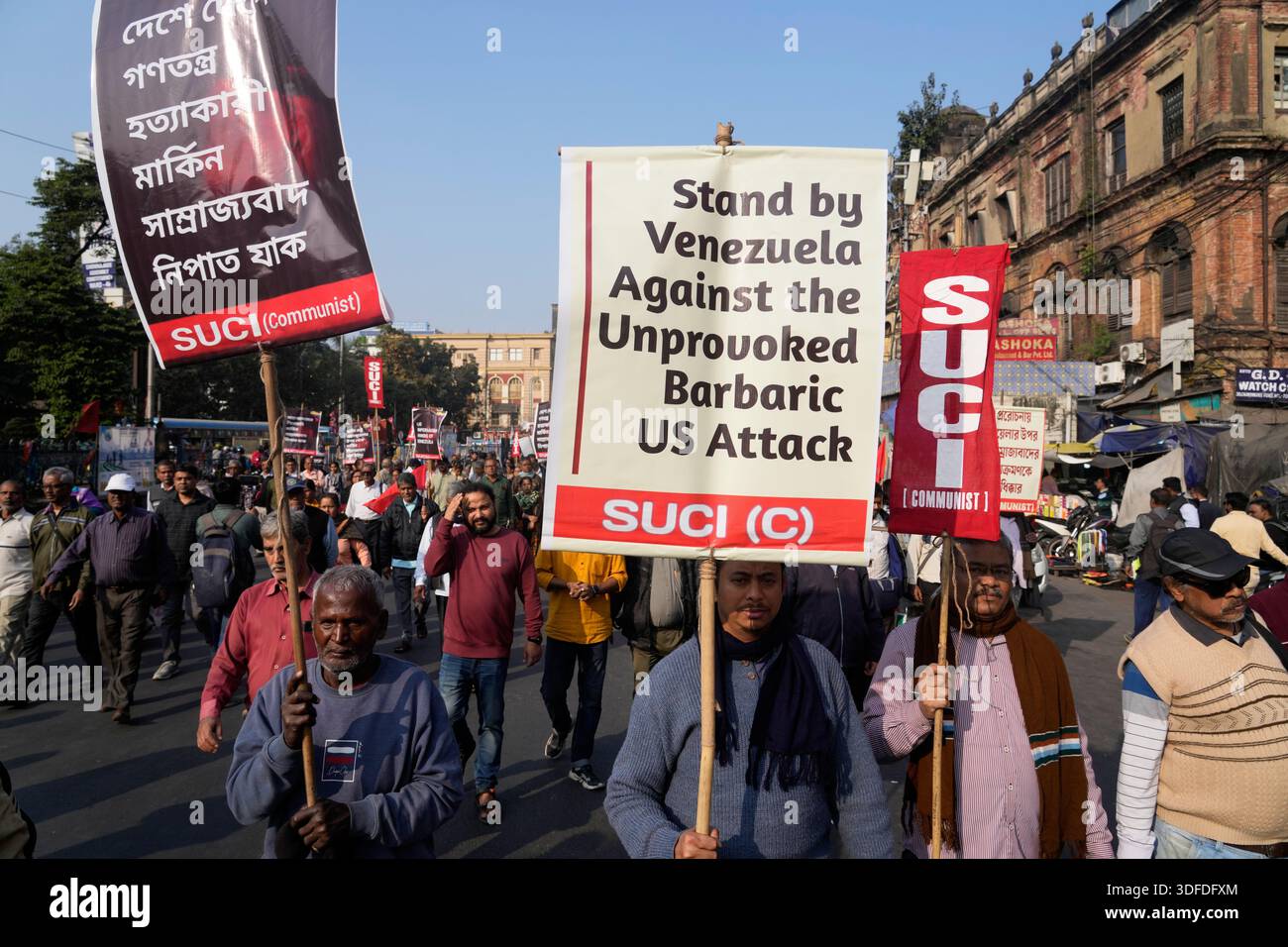 Activists of different leftist parties join a rally with posters and ...