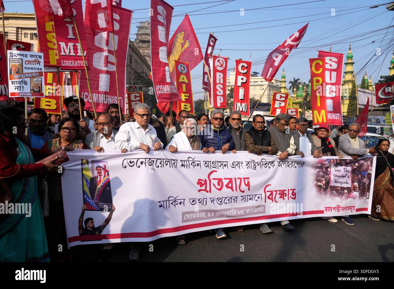 Leaders of leftist parties join in a rally with posters and banners ...