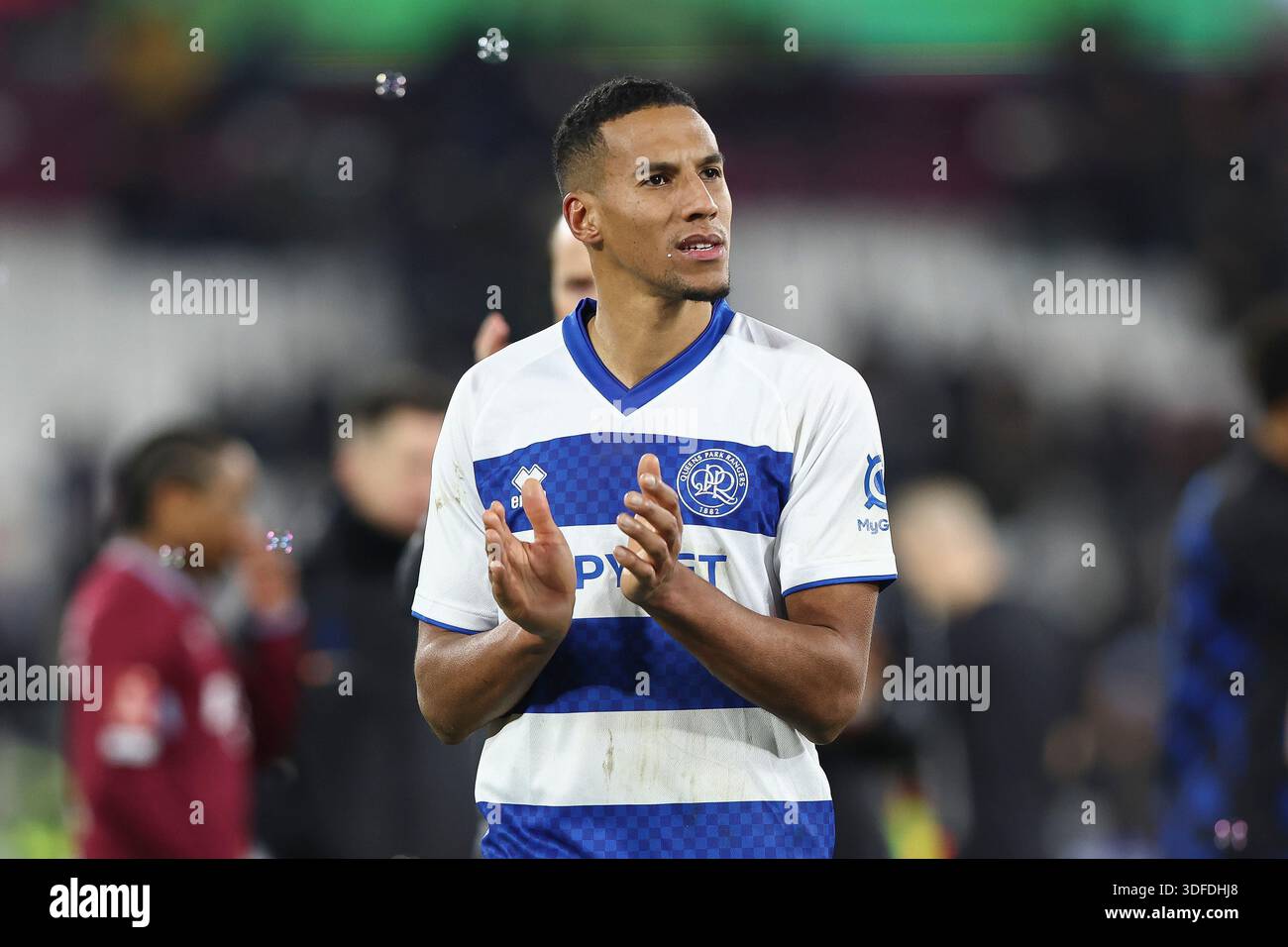 Isaac Hayden of Queens Park Rangers shows his appreciation to the away ...