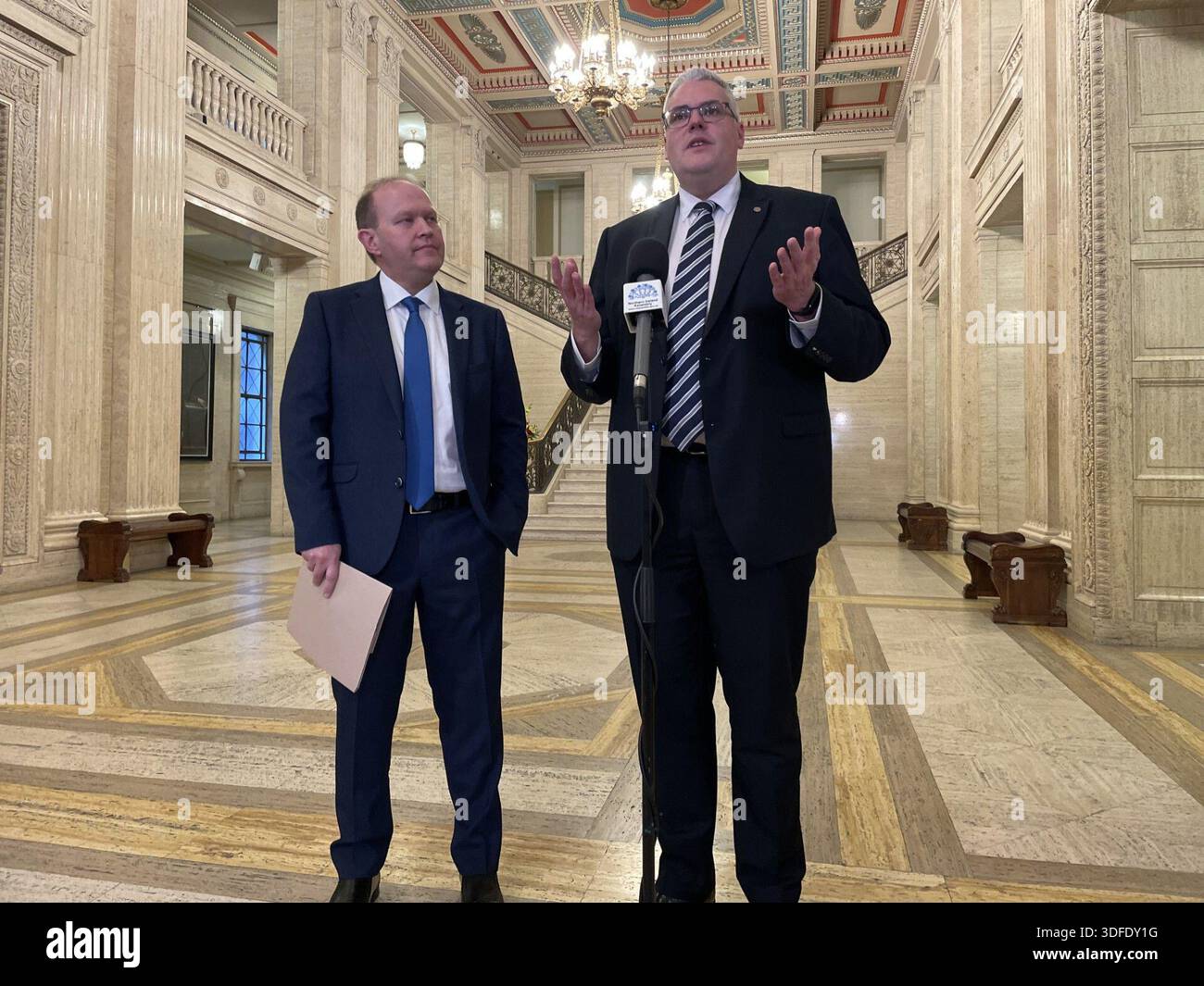 DUP leader Gavin Robinson (right) and party colleague Gareth Wilson ...