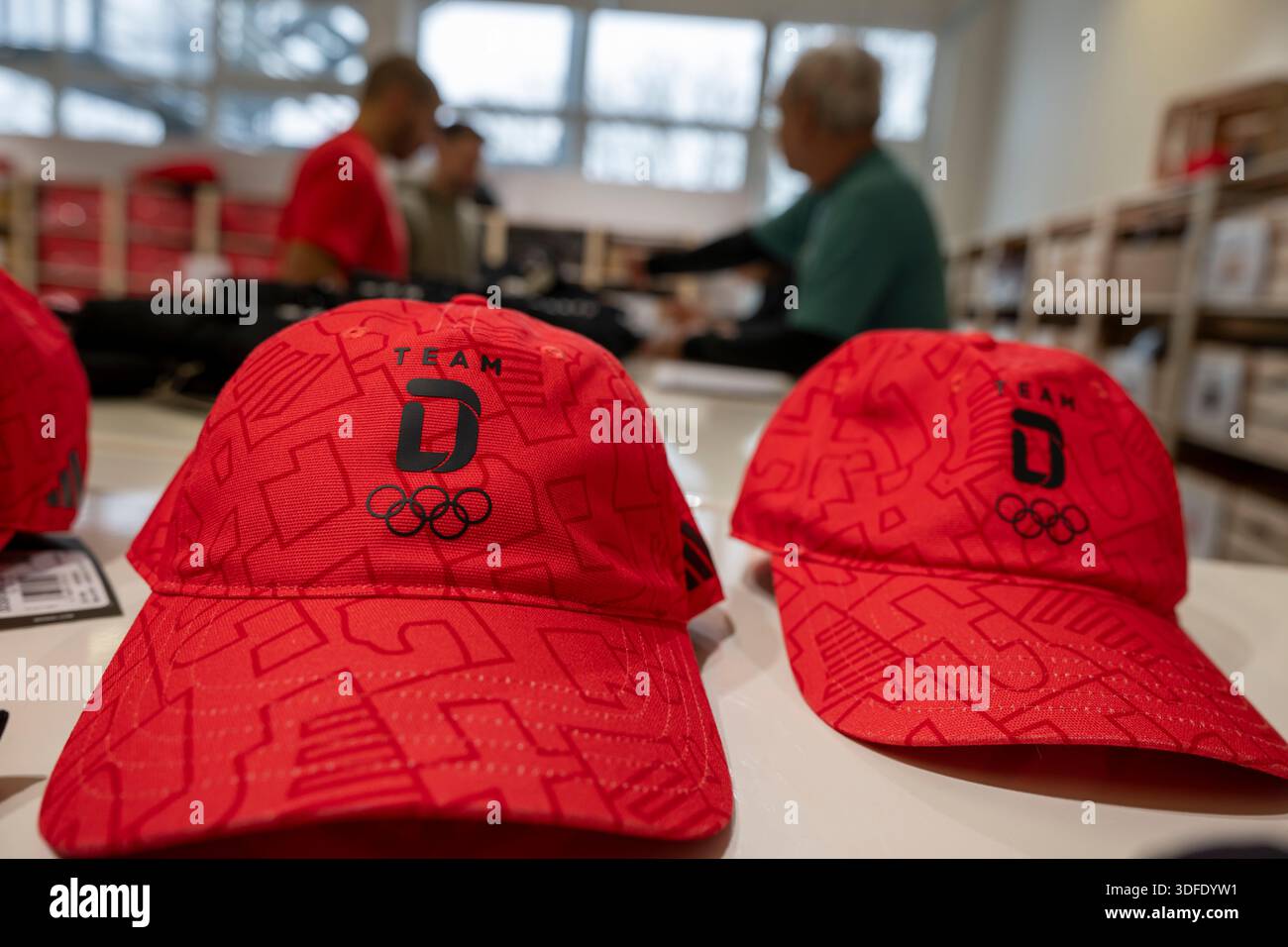12 January 2026, Bavaria, Munich: Baseball caps with the "Team D" logo ...