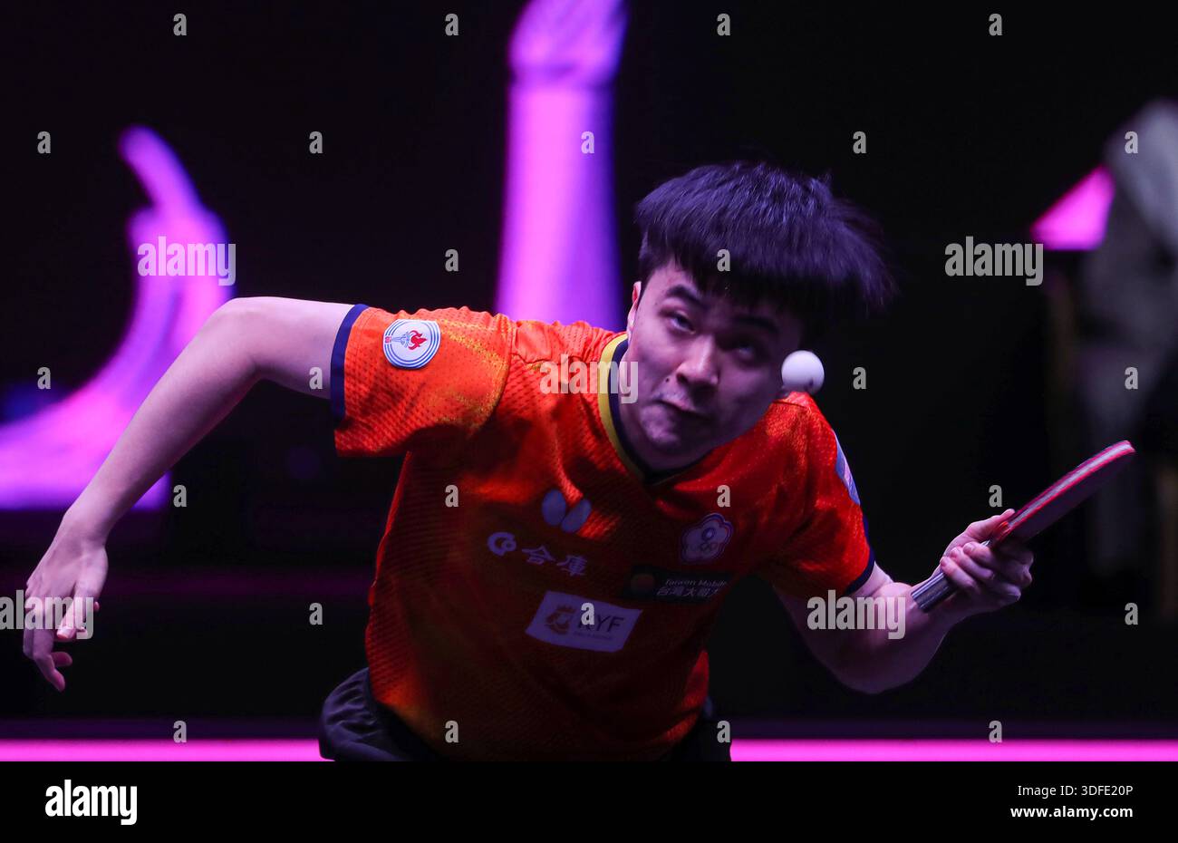 Lin Yun-ju, a player from Taiwan, returns a ball to Tomokazu Harimoto ...