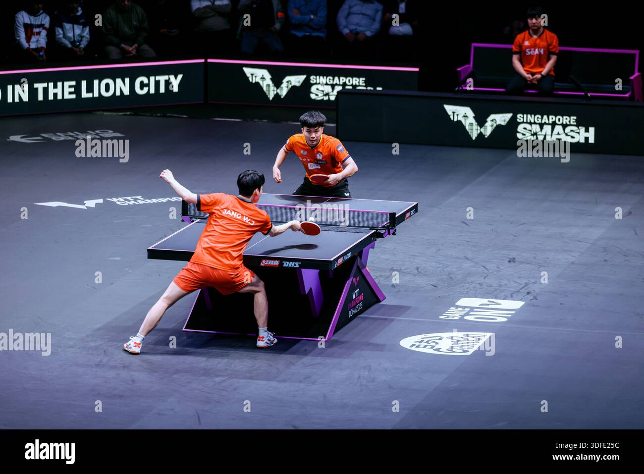 South Korea's Jang Woojin serves against Taiwan's Lin Yun-ju during ...