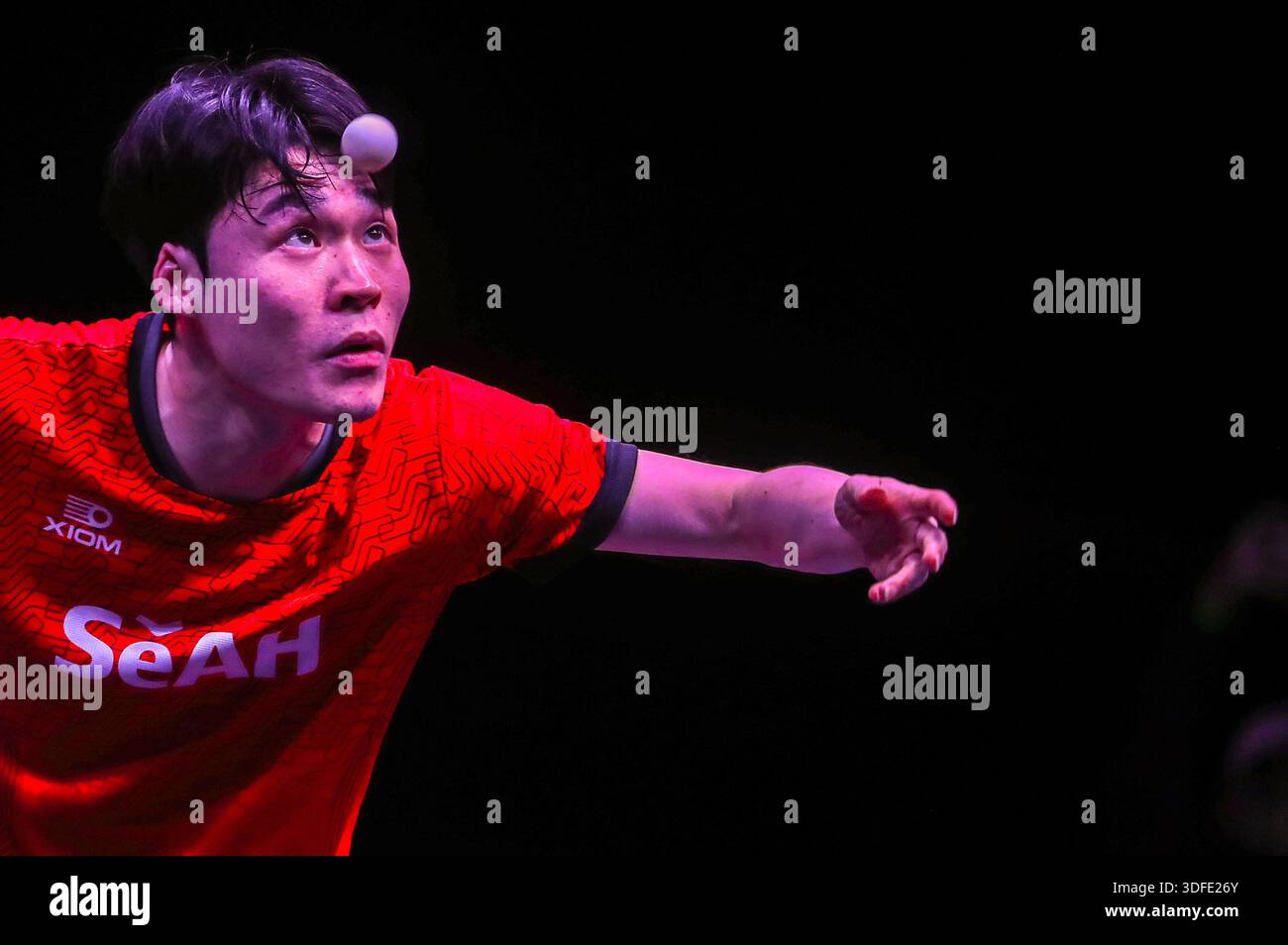 South Korea's Jang Woojin serves against Taiwan's Lin Yun-ju (Not in ...