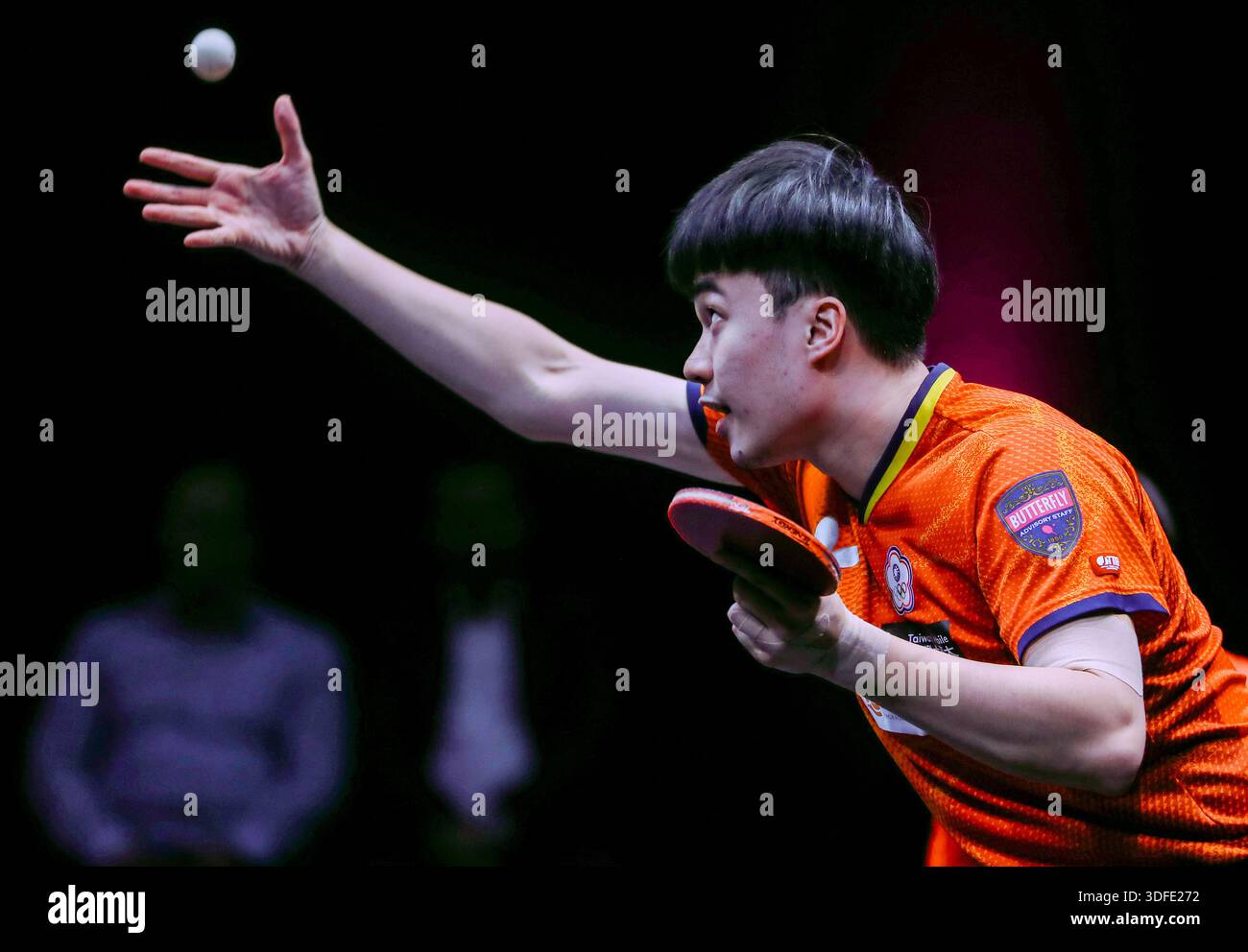 Lin Yun-ju, a player from Taiwan, returns a ball to Tomokazu Harimoto ...