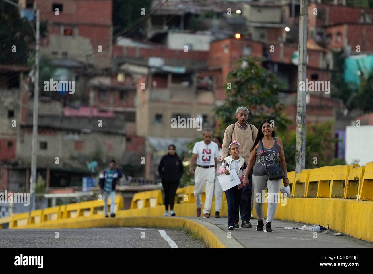 A girl walks to school as classes resume after the holiday break in ...