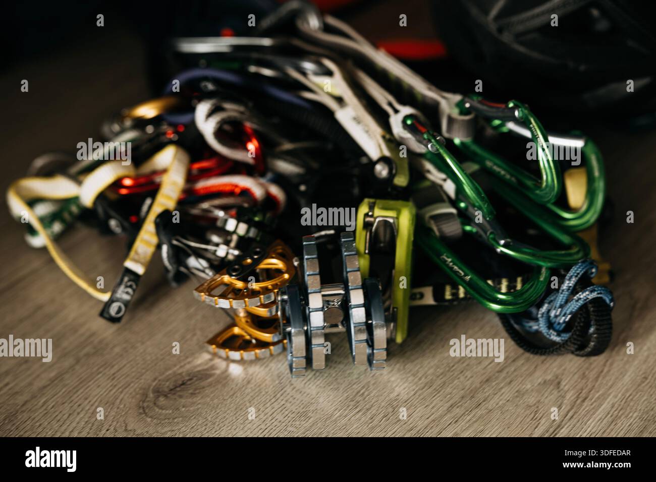 Traditional Rock Climbing Gear On Wooden Surface: Friends, Quick Draws ...