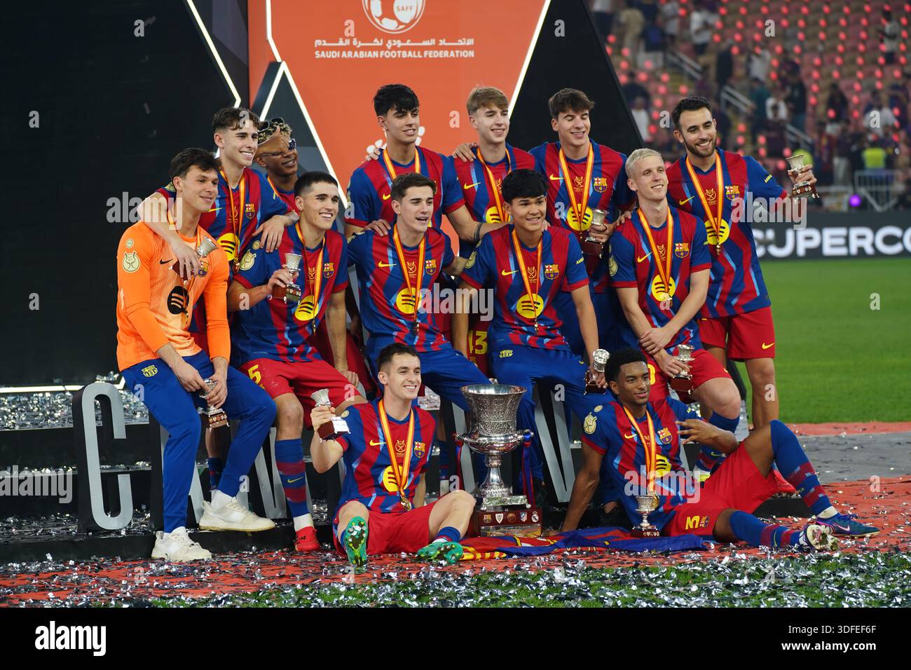 Barcelona's players celebrate with the trophy during the Spanish Super ...