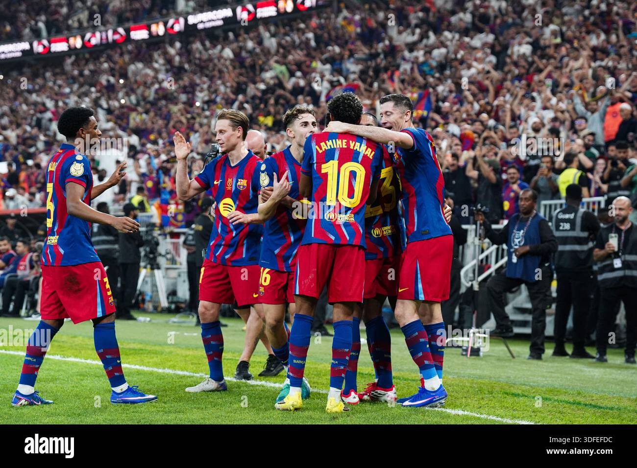 Barcelona players celebrate during the Spanish Super Cup final match ...