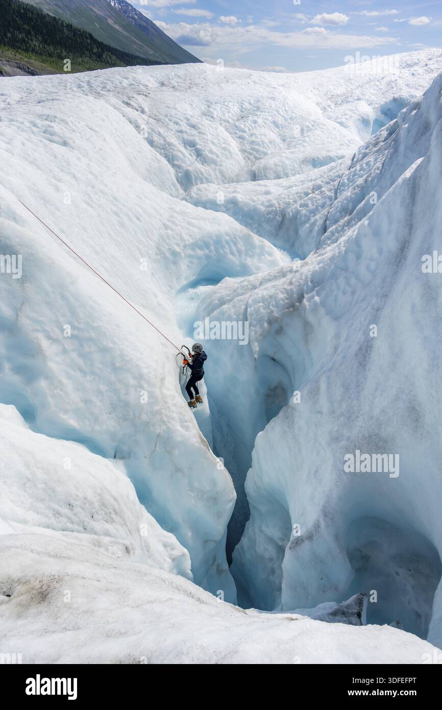 Ice climbers in an ice canyon, Root Glacier, Wrangell St. Elias ...