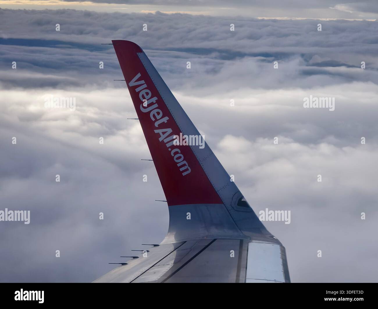 Vietnam, December 21,2025 : An aerial view of the wing of a VietJet ...