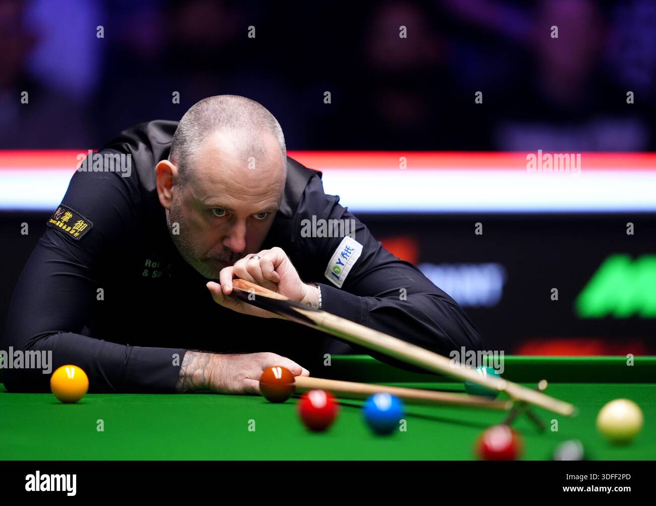 Mark Williams in action against Mark Allen (not in picture) on day two ...