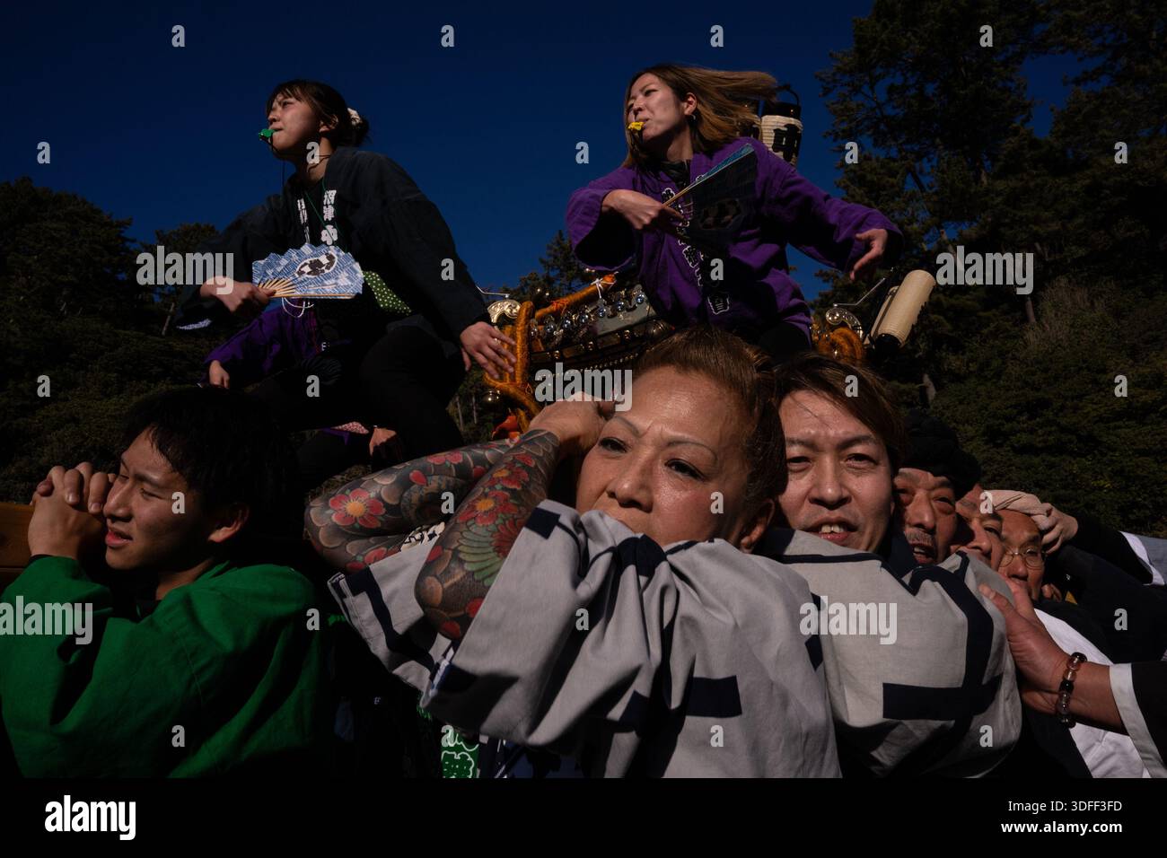 Participants carry a portable shrine 'mikoshi', during the Winter Sea ...