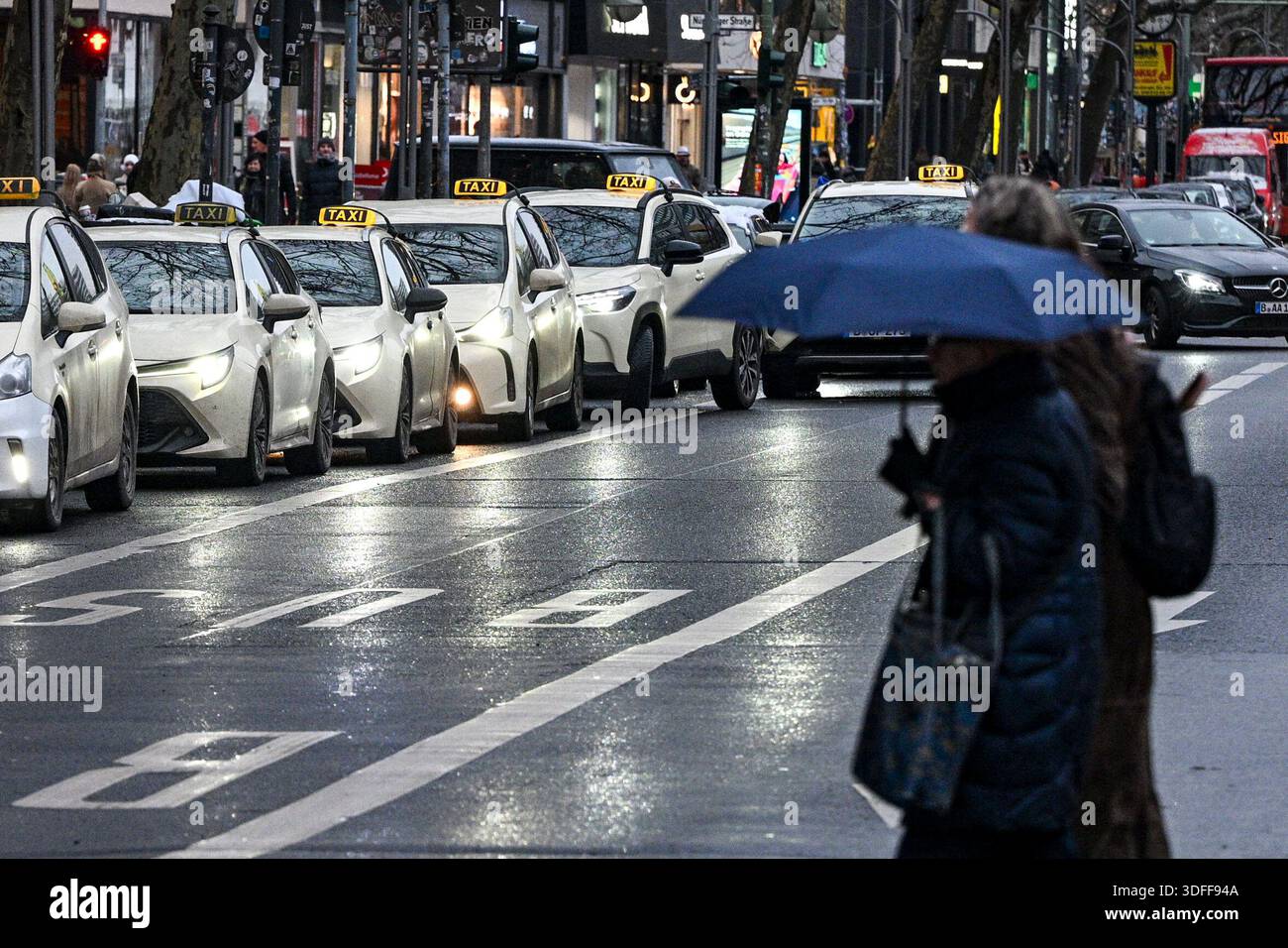 12 January 2026, Berlin: Tauentzienstraße is wet and slippery in the ...