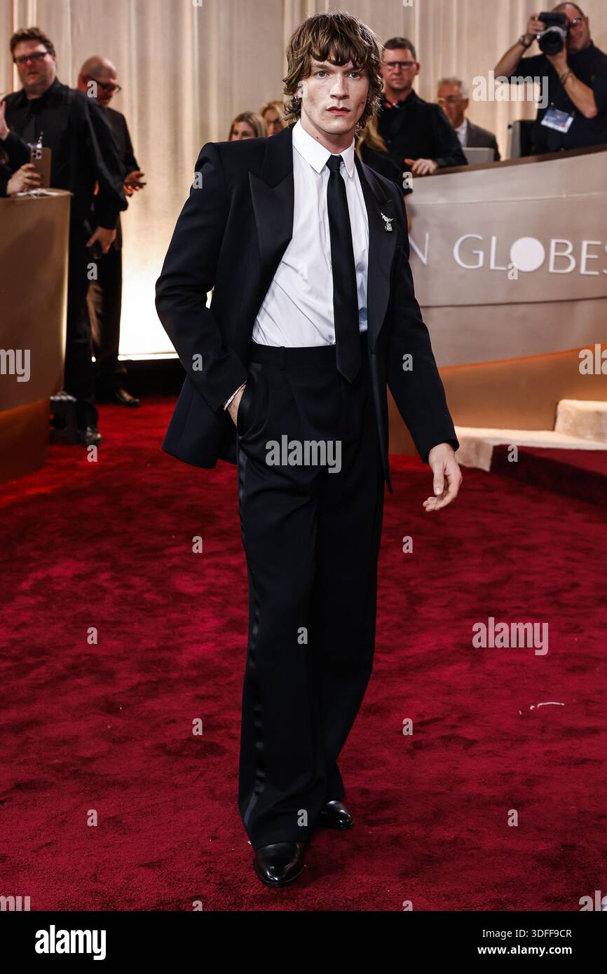 Connor Storrie walking on the red carpet at The 83rd Annual Golden ...
