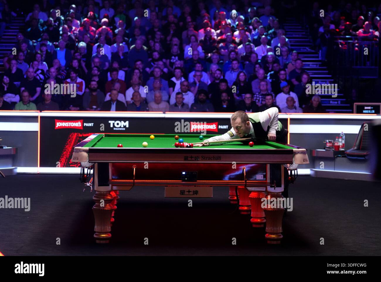 Mark Allen in action against Mark Williams (not in picture) on day two ...