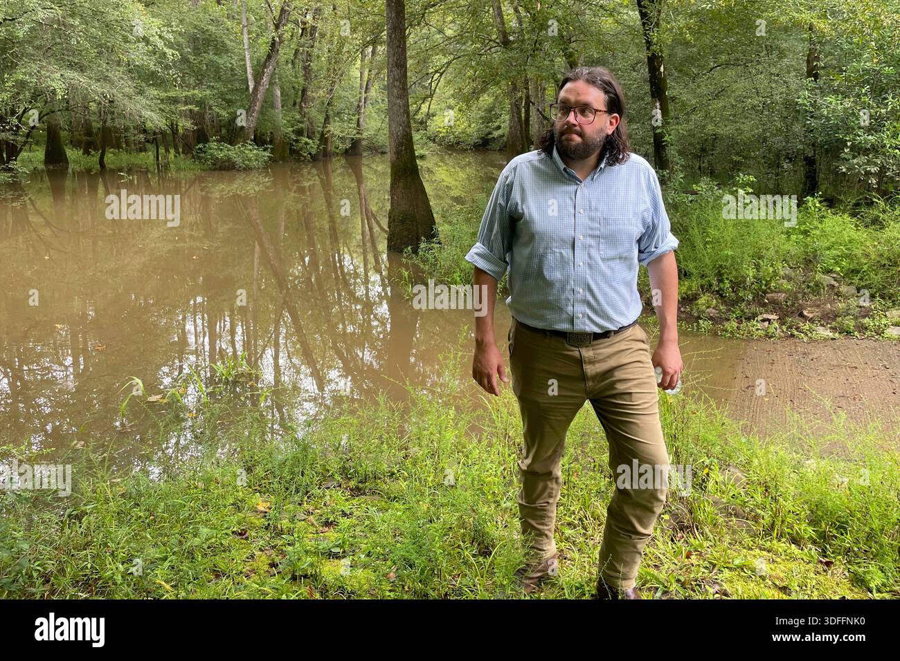 FILE - Seth Clark, then mayor pro-tem of Macon, walks in the Bond Swamp ...