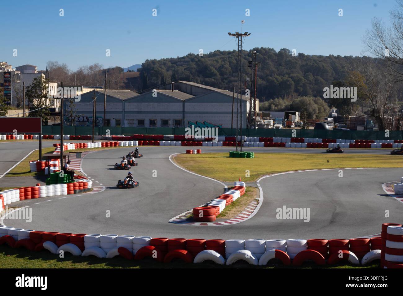 karting circuit with karts racing Stock Photo - Alamy