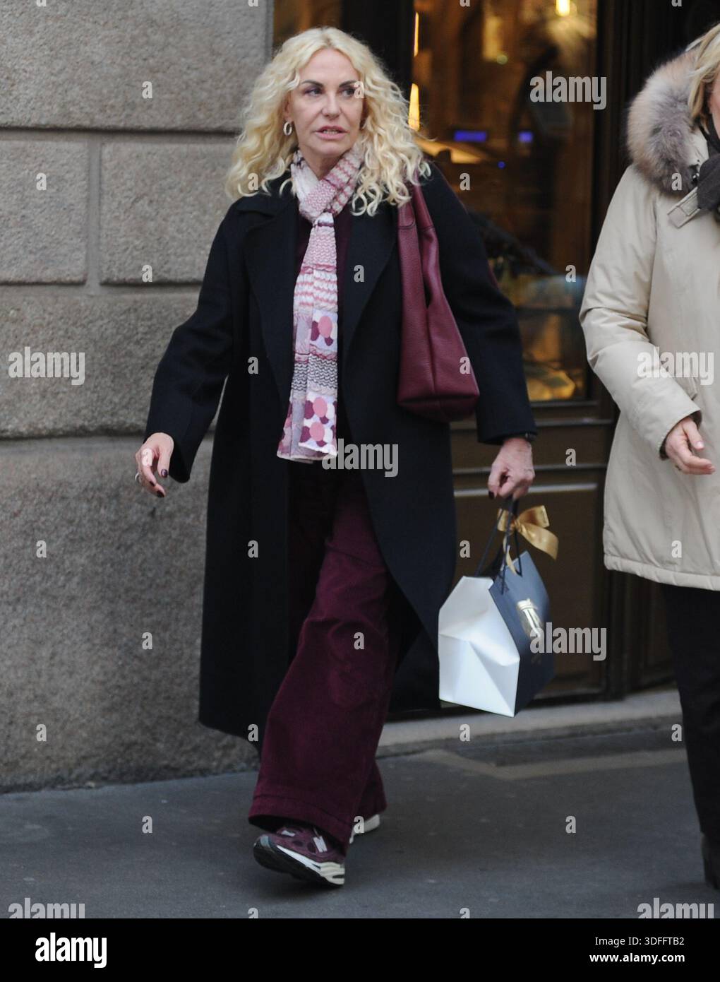 Milan Antonella Clerici arrives downtown with two friends, and after ...