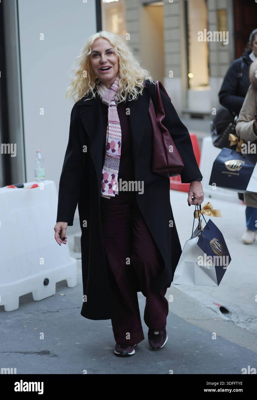 Milan Antonella Clerici arrives downtown with two friends, and after ...