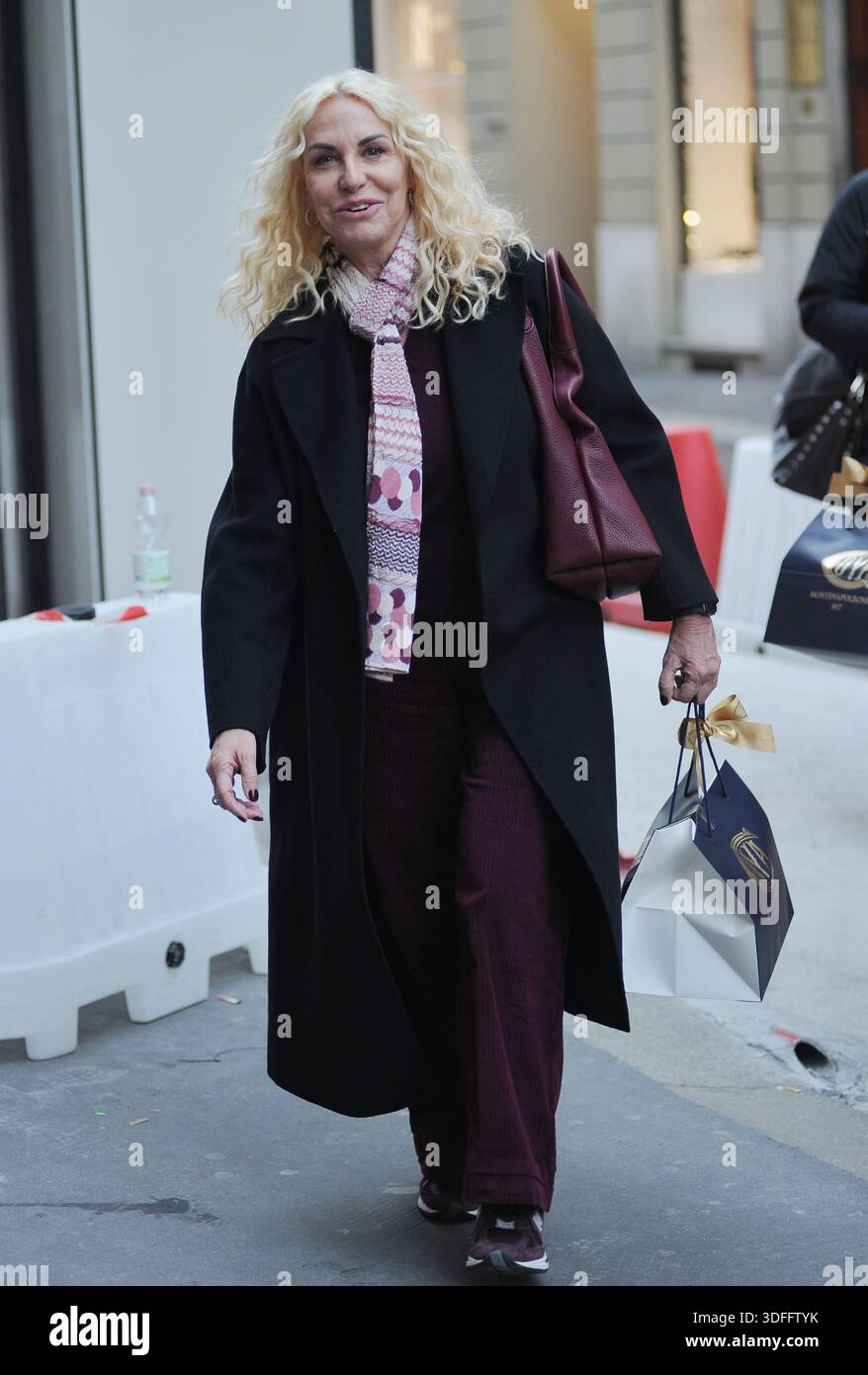 Milan Antonella Clerici arrives downtown with two friends, and after ...