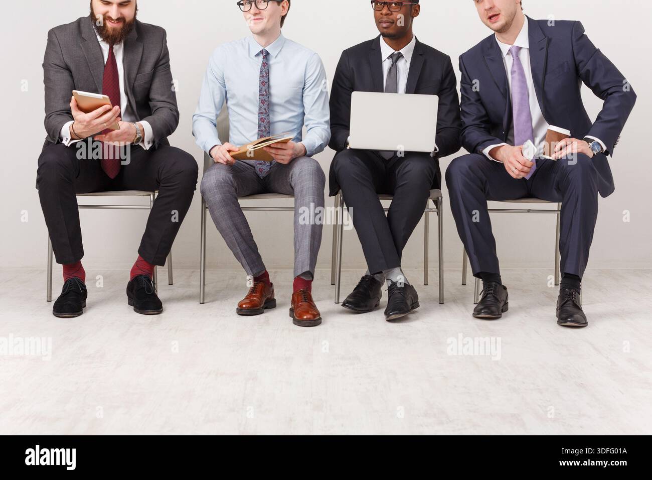Business men in suits hi-res stock photography and images - Alamy